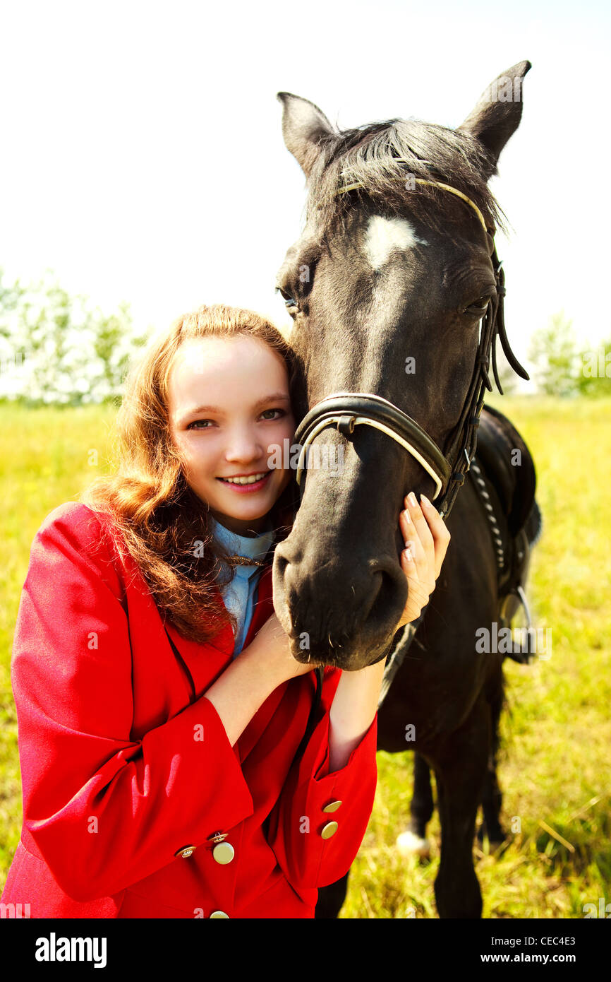 happy woman riding a horse Stock Photo - Alamy