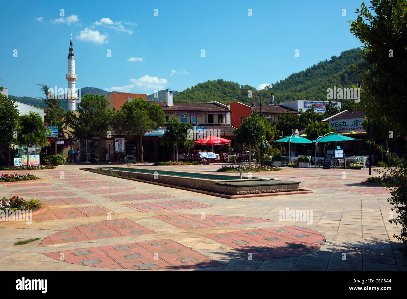 Gocek's modern town square with shops and mosque in the background ...