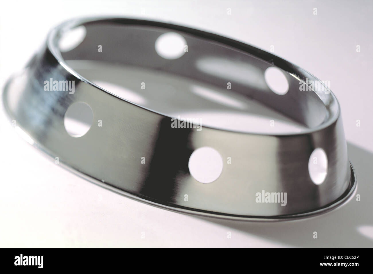 Cut out: Ring to put down the wok Stock Photo - Alamy