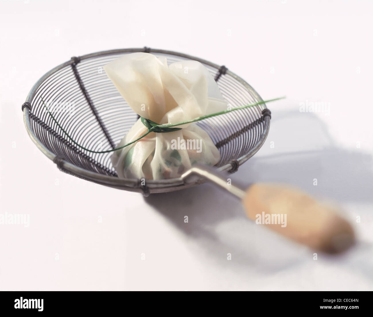 Strainer with steamed rice bag hi-res stock photography and images - Alamy