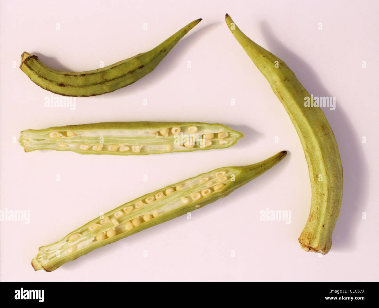 Cut out: Okra hull (whole fruit and sliced half Stock Photo - Alamy