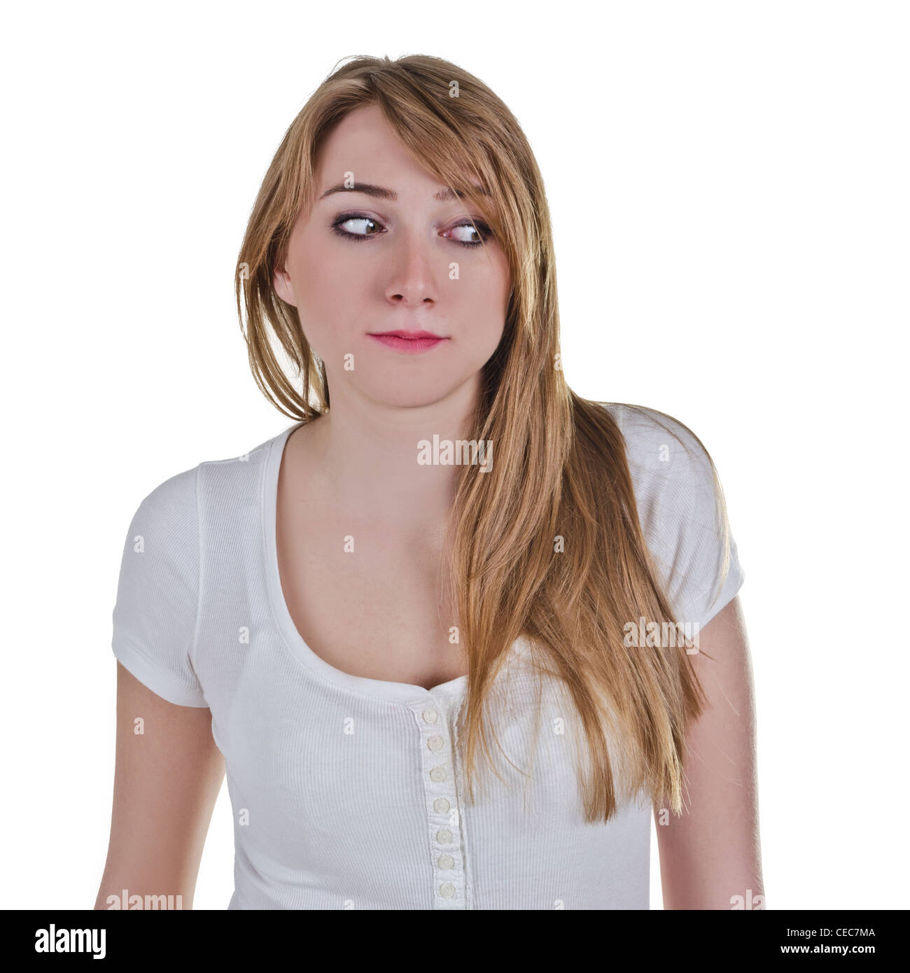 Young woman looking down-left with expression as she is afraid of ...