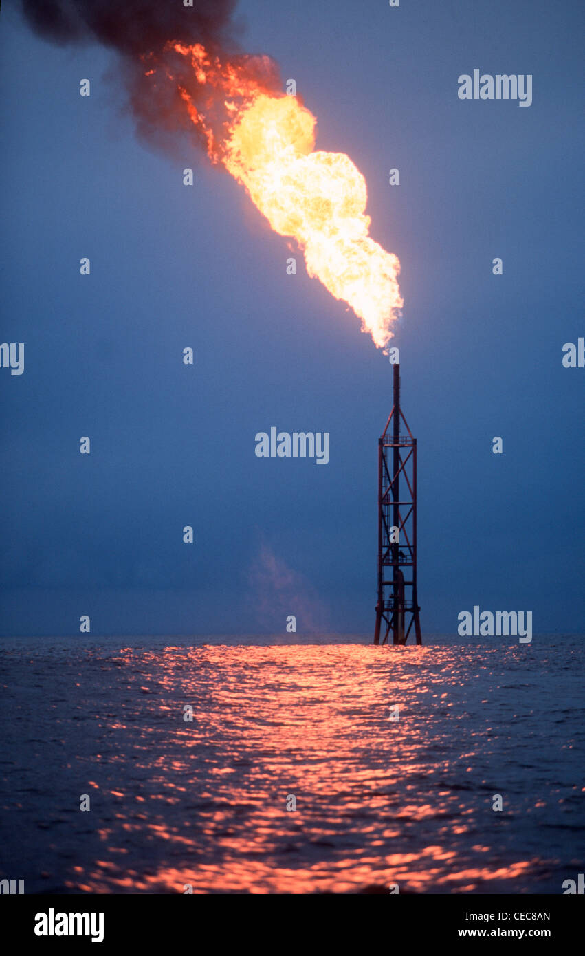 Flaring gas from offshore oil platform, West Africa Stock Photo - Alamy