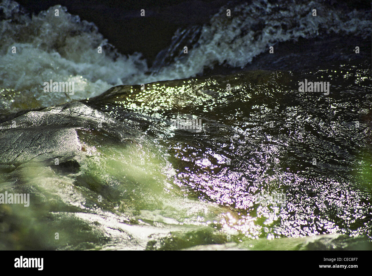 Fast flowing flood water Stock Photo - Alamy