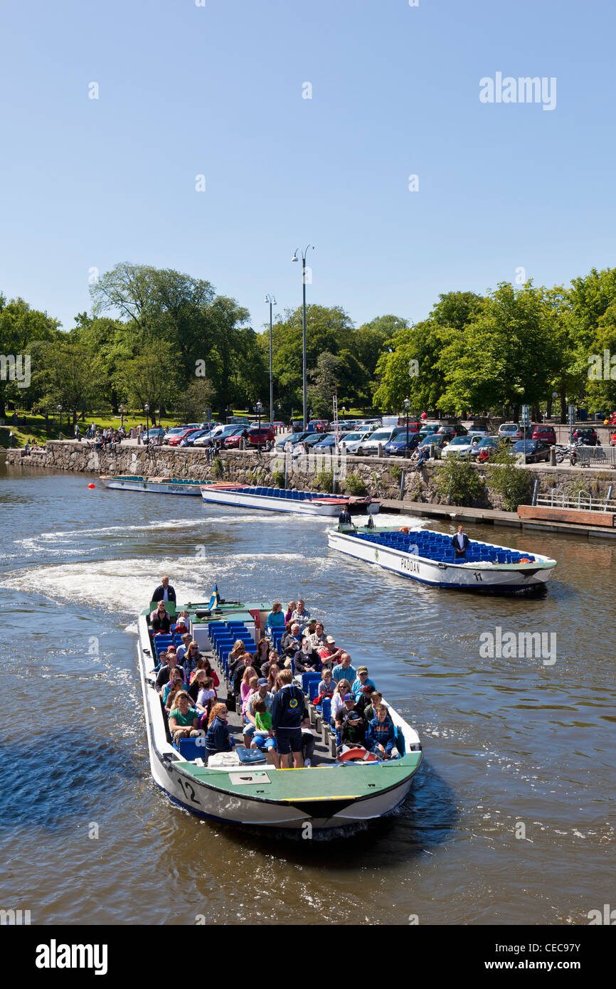Tourists who travel on sightseeing canal boat Paddan in Gothenburg ...