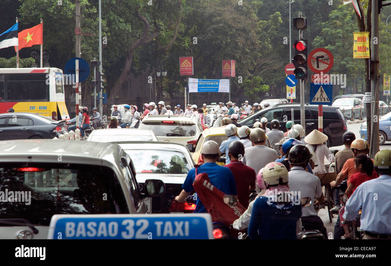 Not a traffic jam but normal traffic at a stop light in Hanoi--buses ...