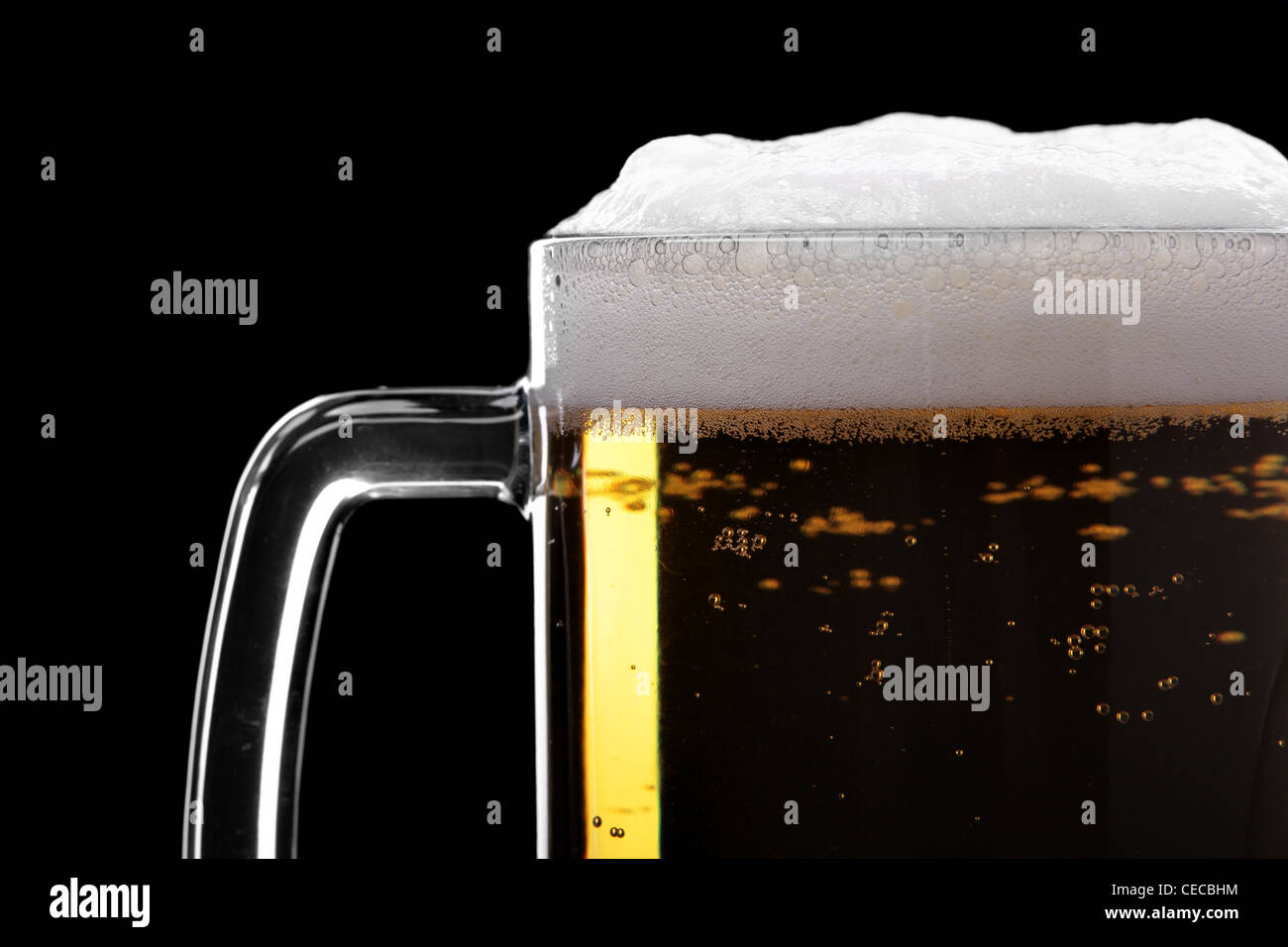 Beer mud with froth close-up isolated over the black background Stock ...
