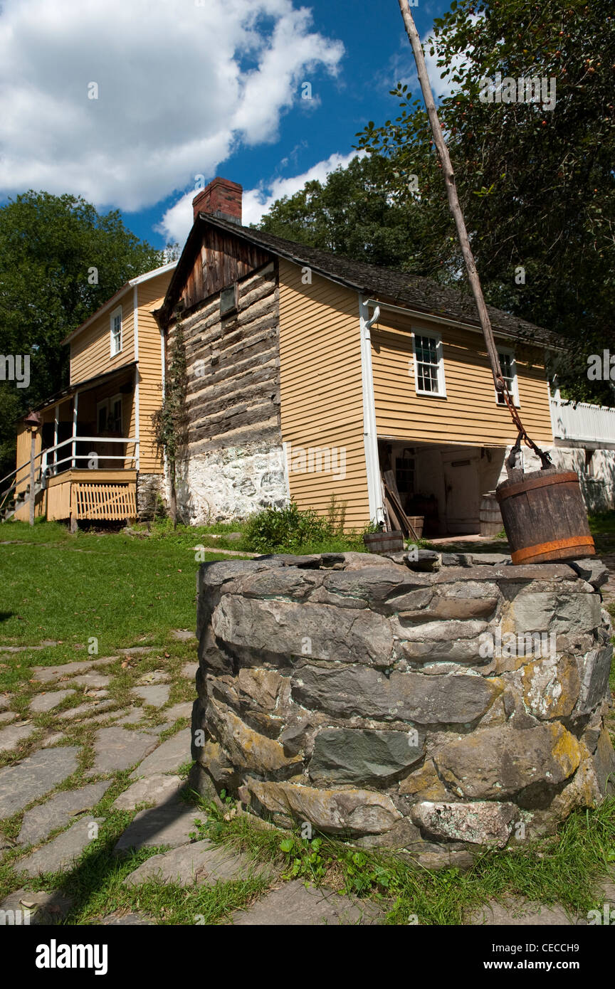 Farmhouse and well at Quiet Valley historical farm, a working 1800's ...
