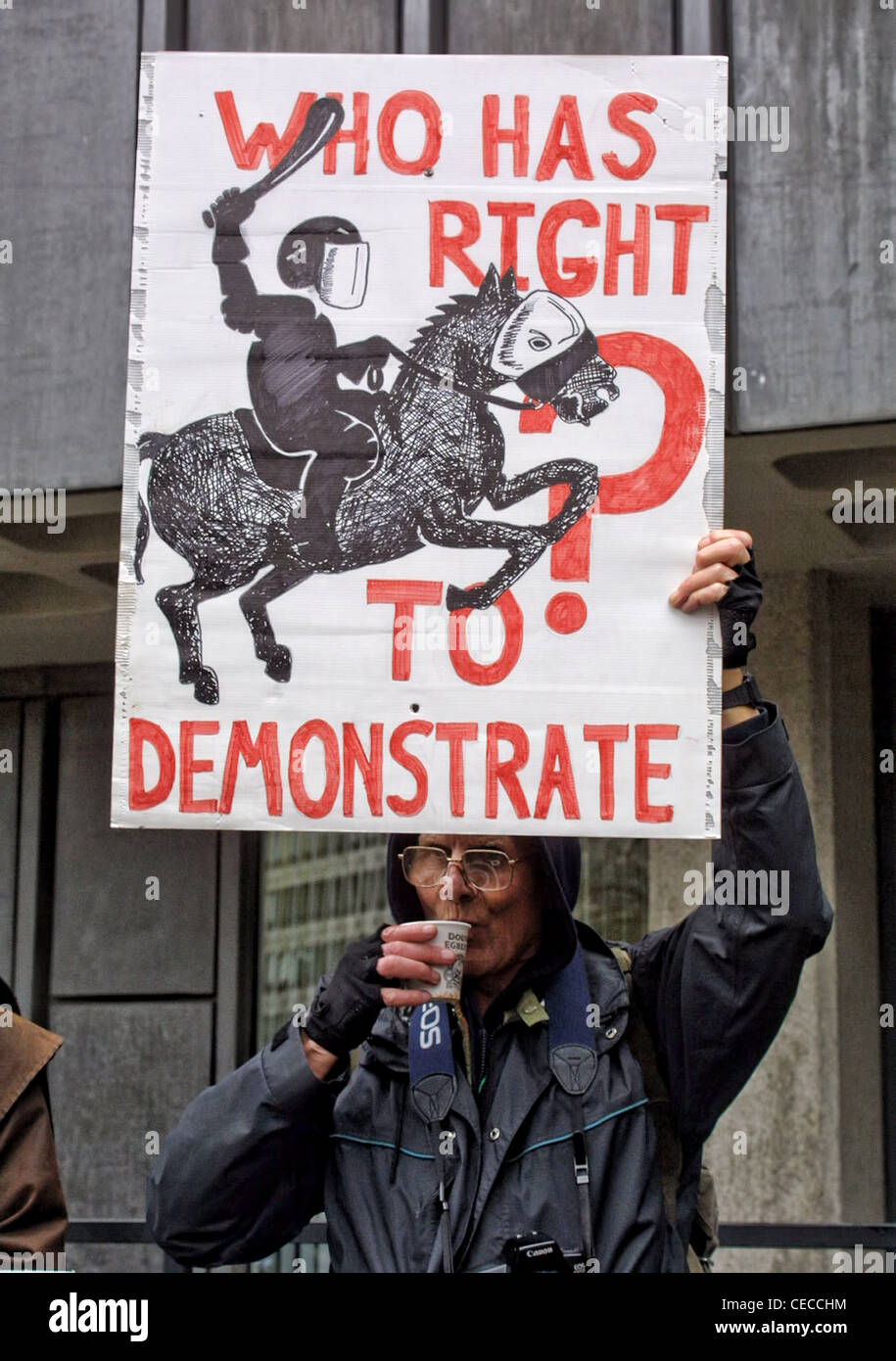 Man holding a banner stating the right to demonstrate in London, United ...