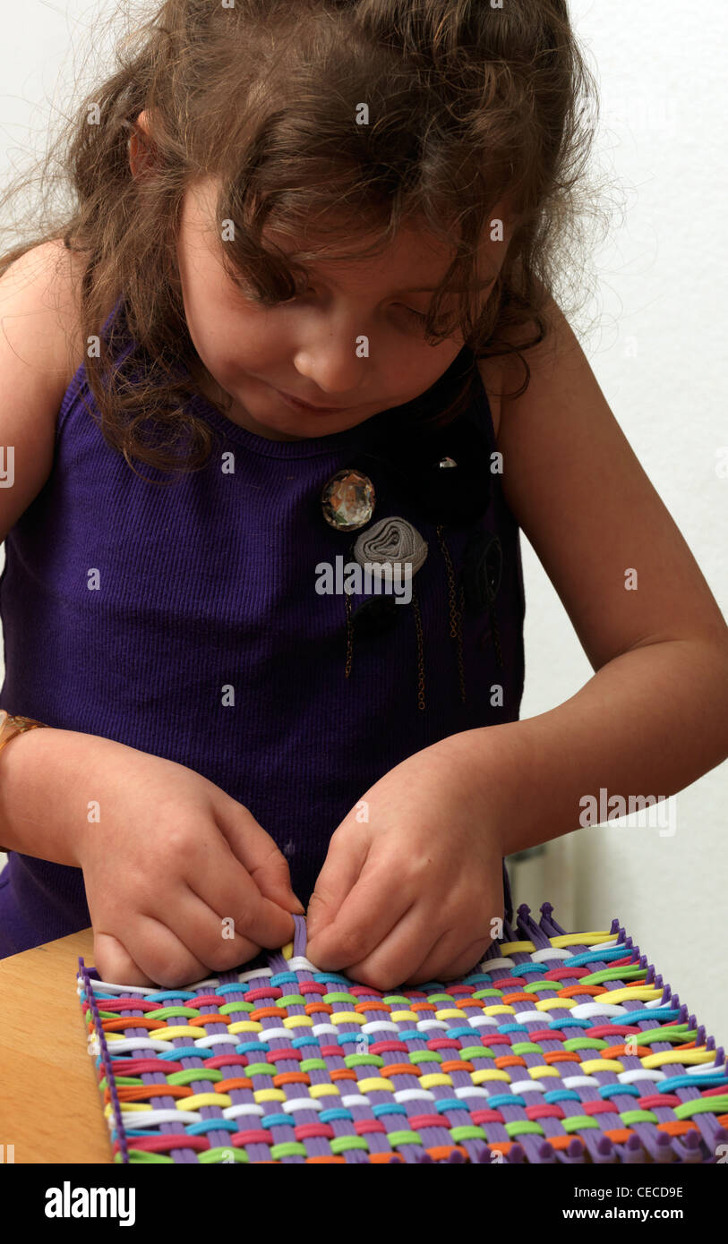 Weaving girl hi-res stock photography and images - Alamy