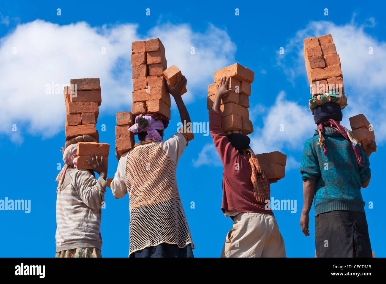 Carrying Bricks On Head High Resolution Stock Photography and Images ...