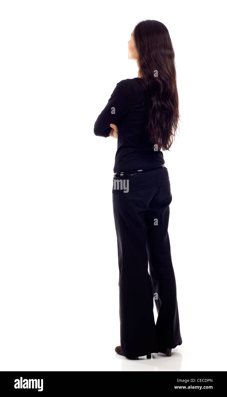 Asian business woman from the back - looking at something isolated over ...