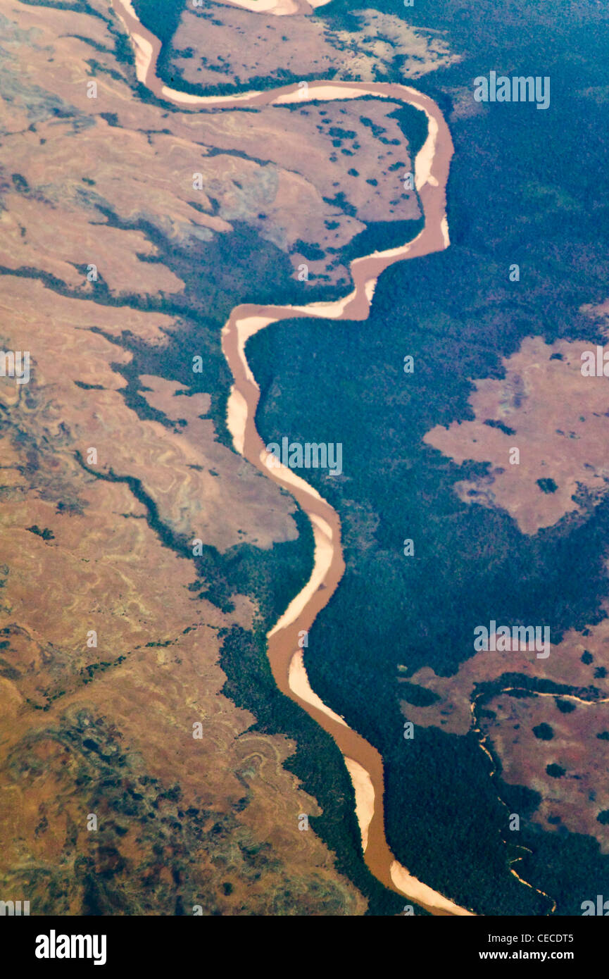 Aerial view of river flowing through land below, Madagascar Stock Photo ...