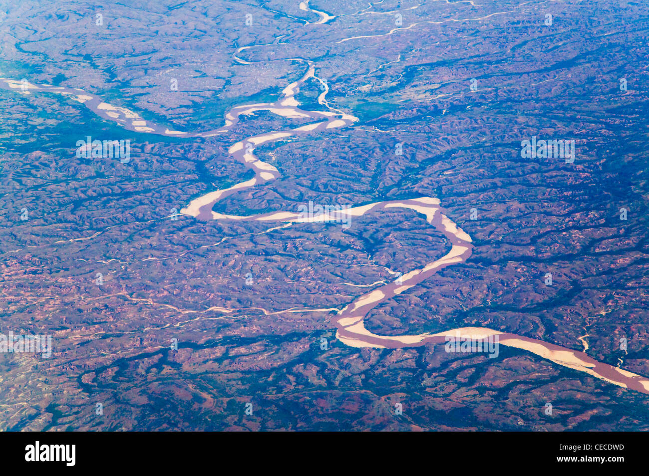 Aerial view of river flowing through land below, Madagascar Stock Photo ...