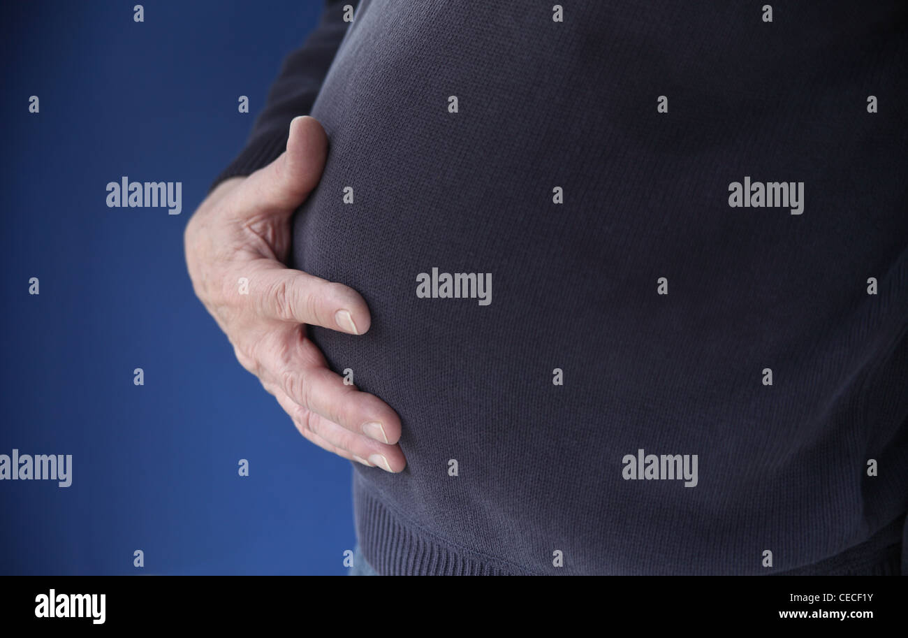 Man with paunch hi-res stock photography and images - Alamy