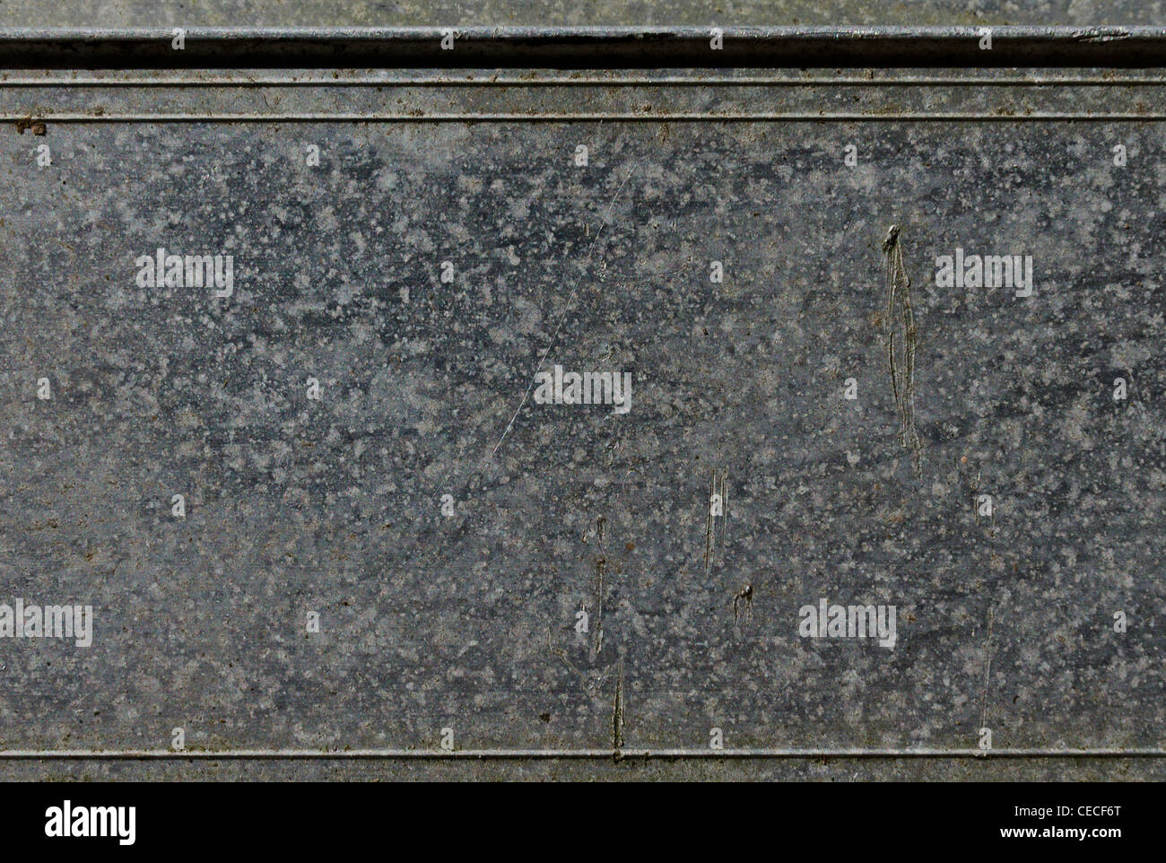 A gray texture, metal, grunge, abstract, background with scratches and ...