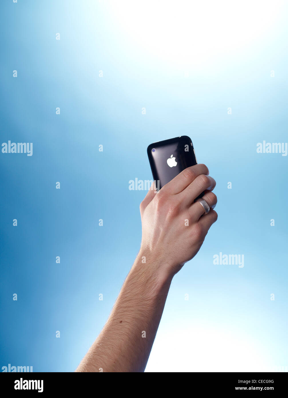 iPhone held aloft Stock Photo - Alamy