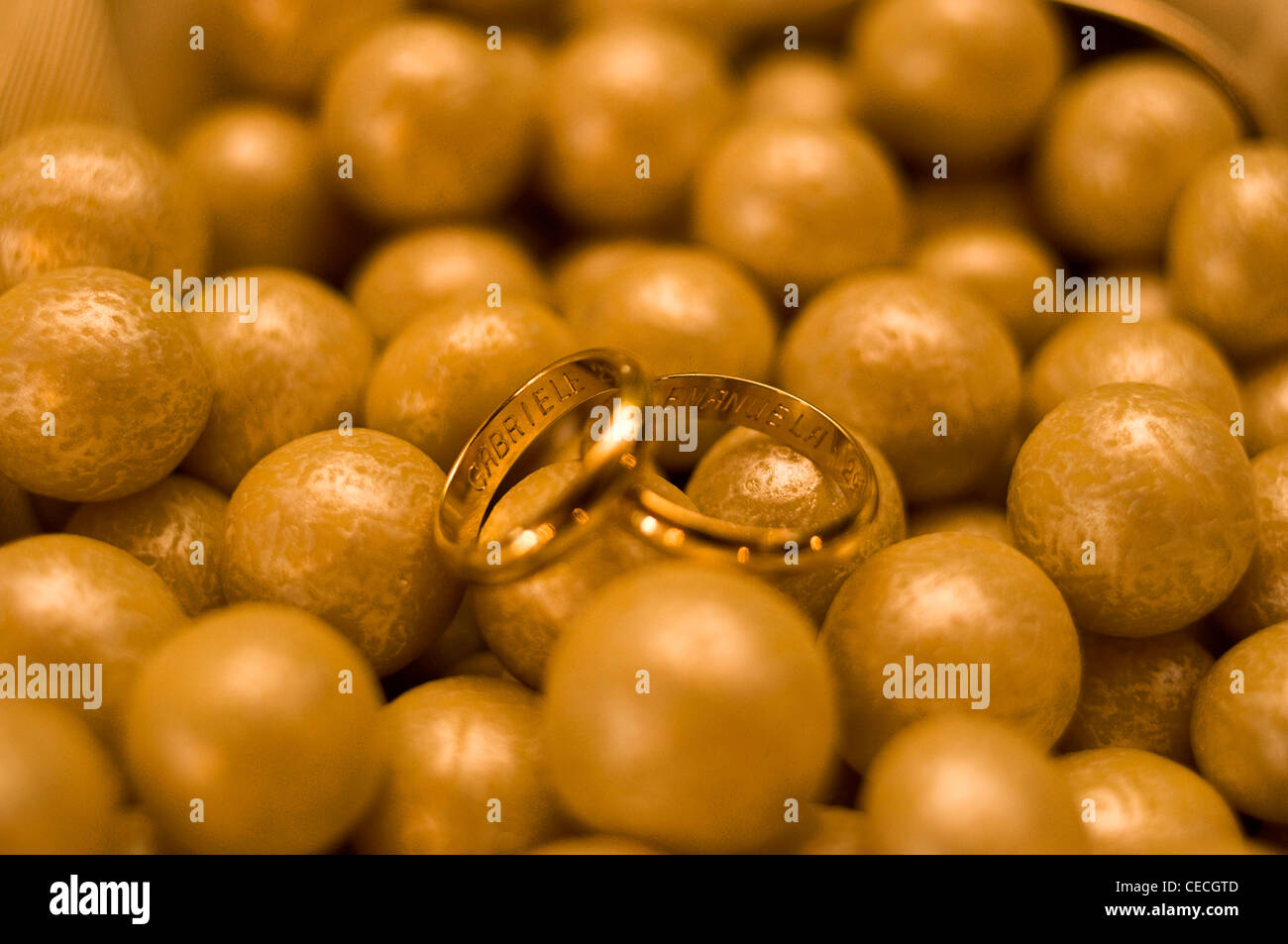 wedding rings on top of sweets at an italian wedding Stock Photo - Alamy