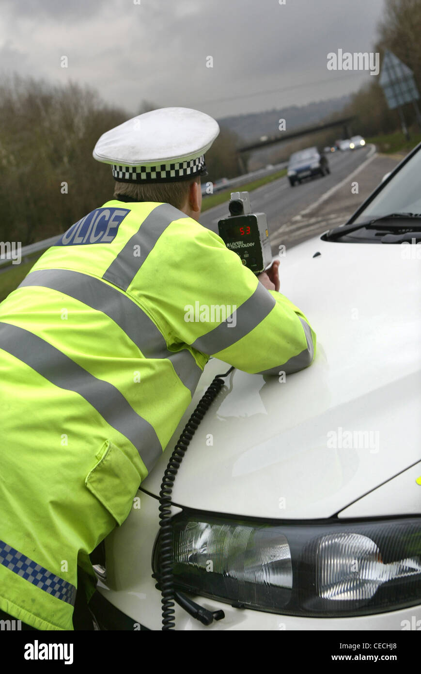 Policeman with speed gun hi-res stock photography and images - Alamy