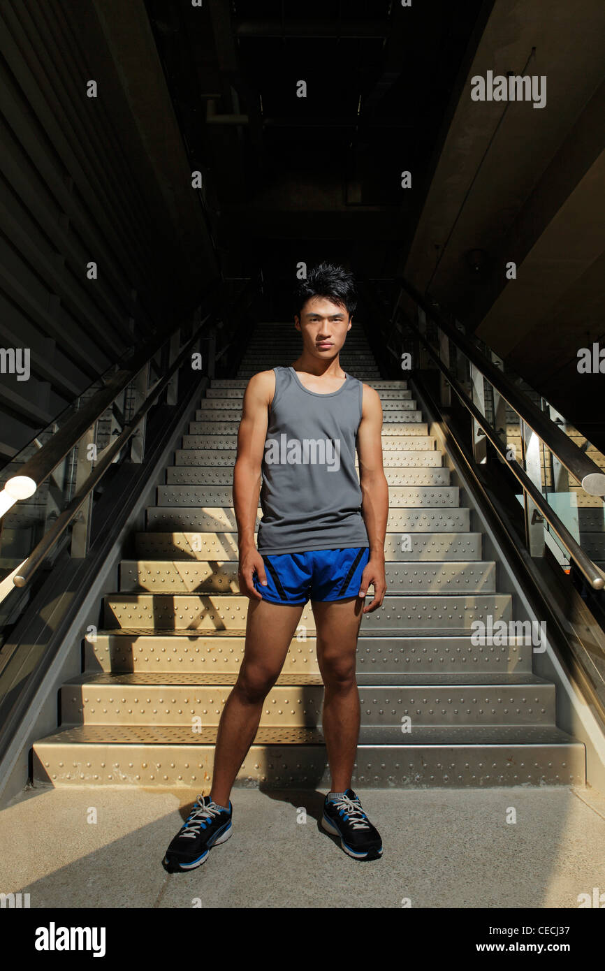 Full portrait of young man standing hi-res stock photography and images ...
