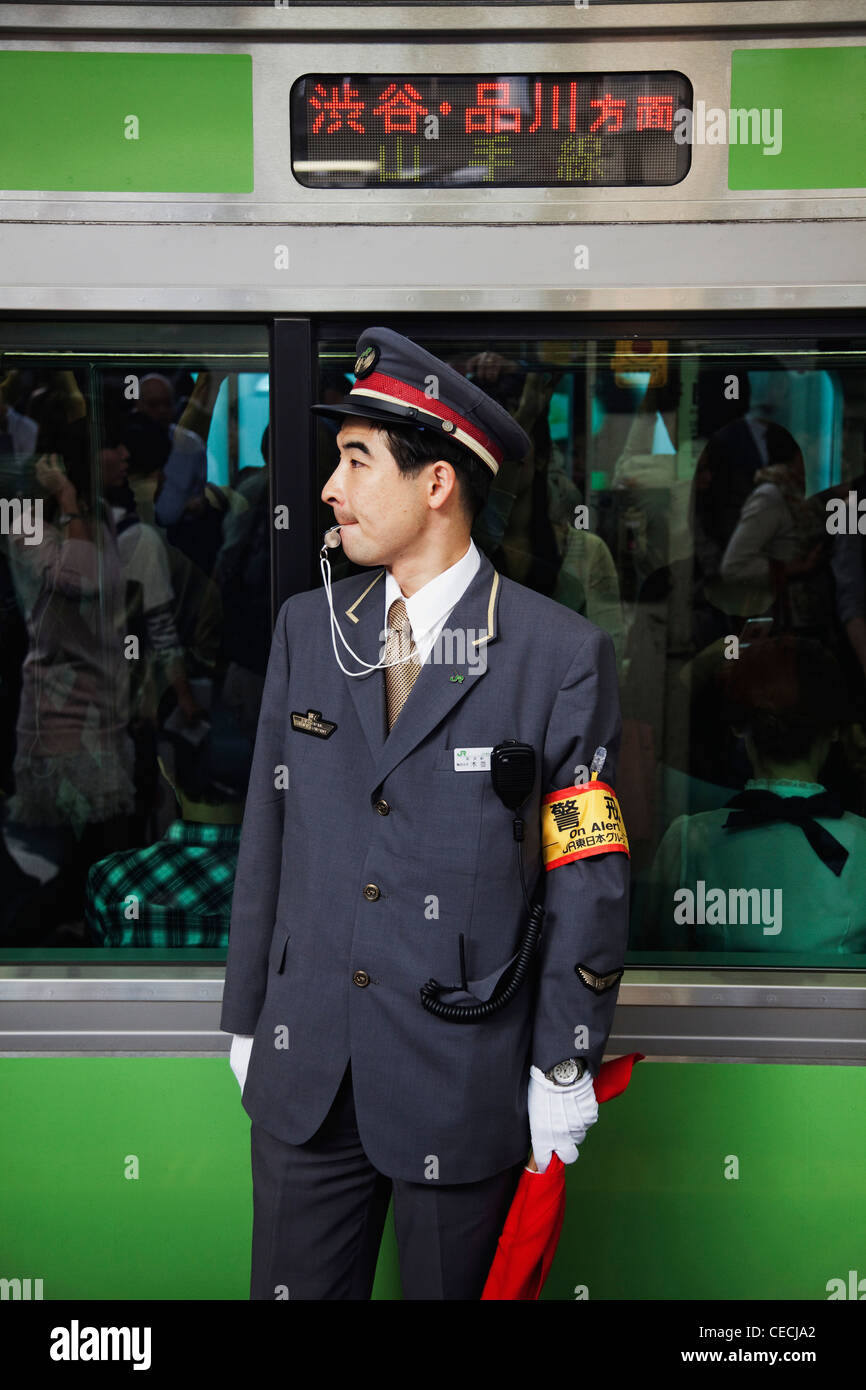 Shinjuku Railway Station Platform Guard. Japan Stock Photo - Alamy