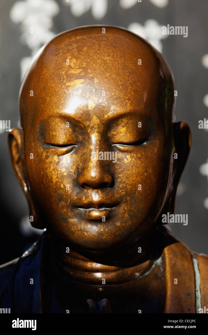 Bronze head of Buddha statue. Asakusa Kannon Temple, Japan Stock Photo ...
