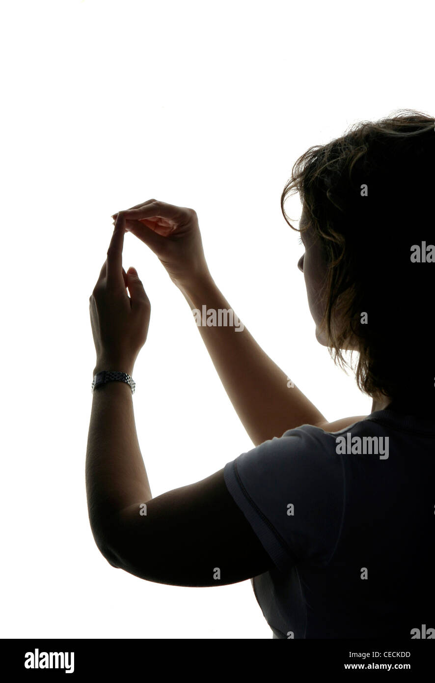 Woman using sign language Stock Photo - Alamy