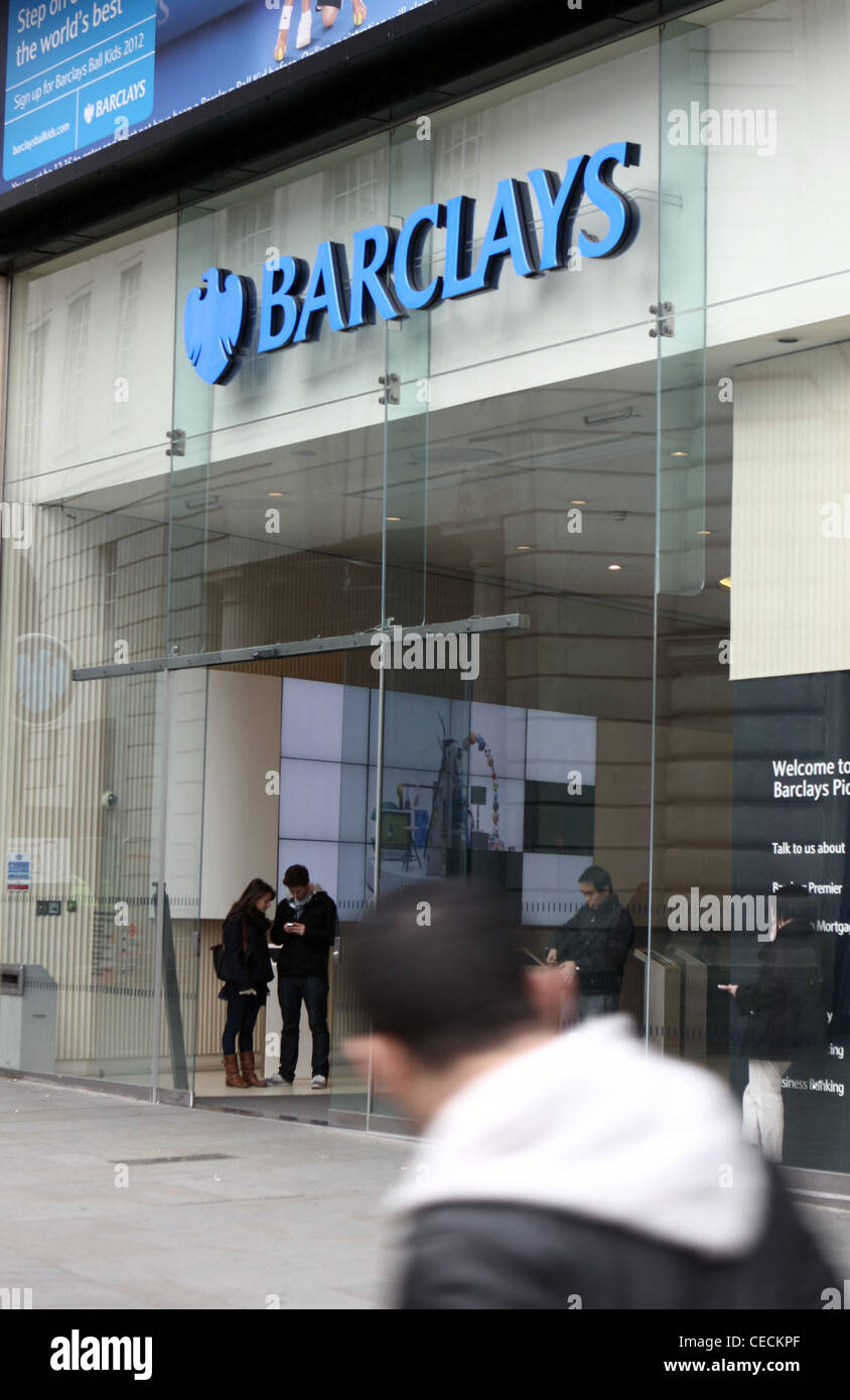 The entrance to Barclays Bank in Piccadilly, London with people walking ...