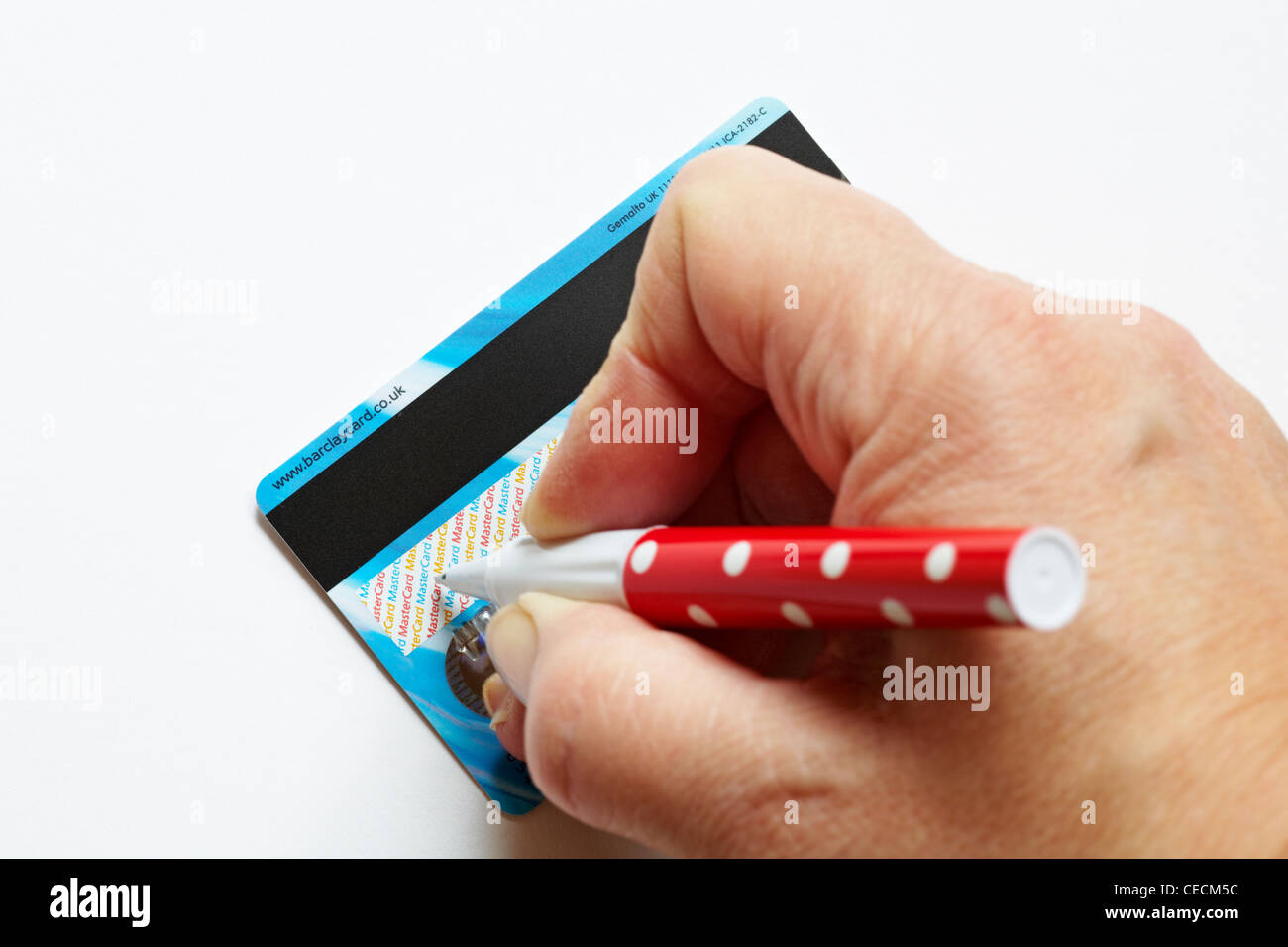 signing new Mastercard set on white background Stock Photo - Alamy