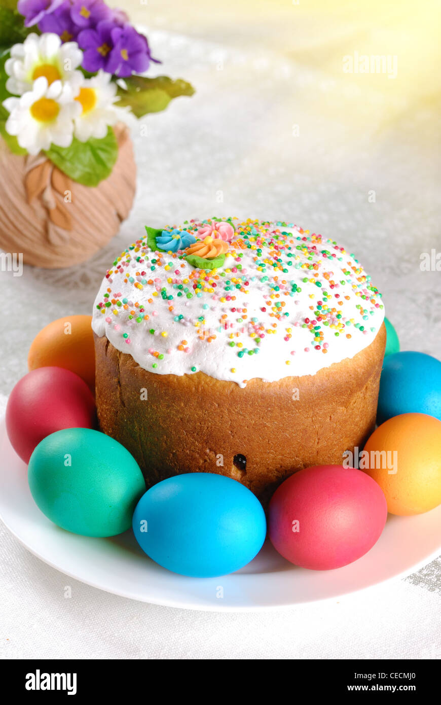 Easter eggs and cake on the bright background Stock Photo - Alamy