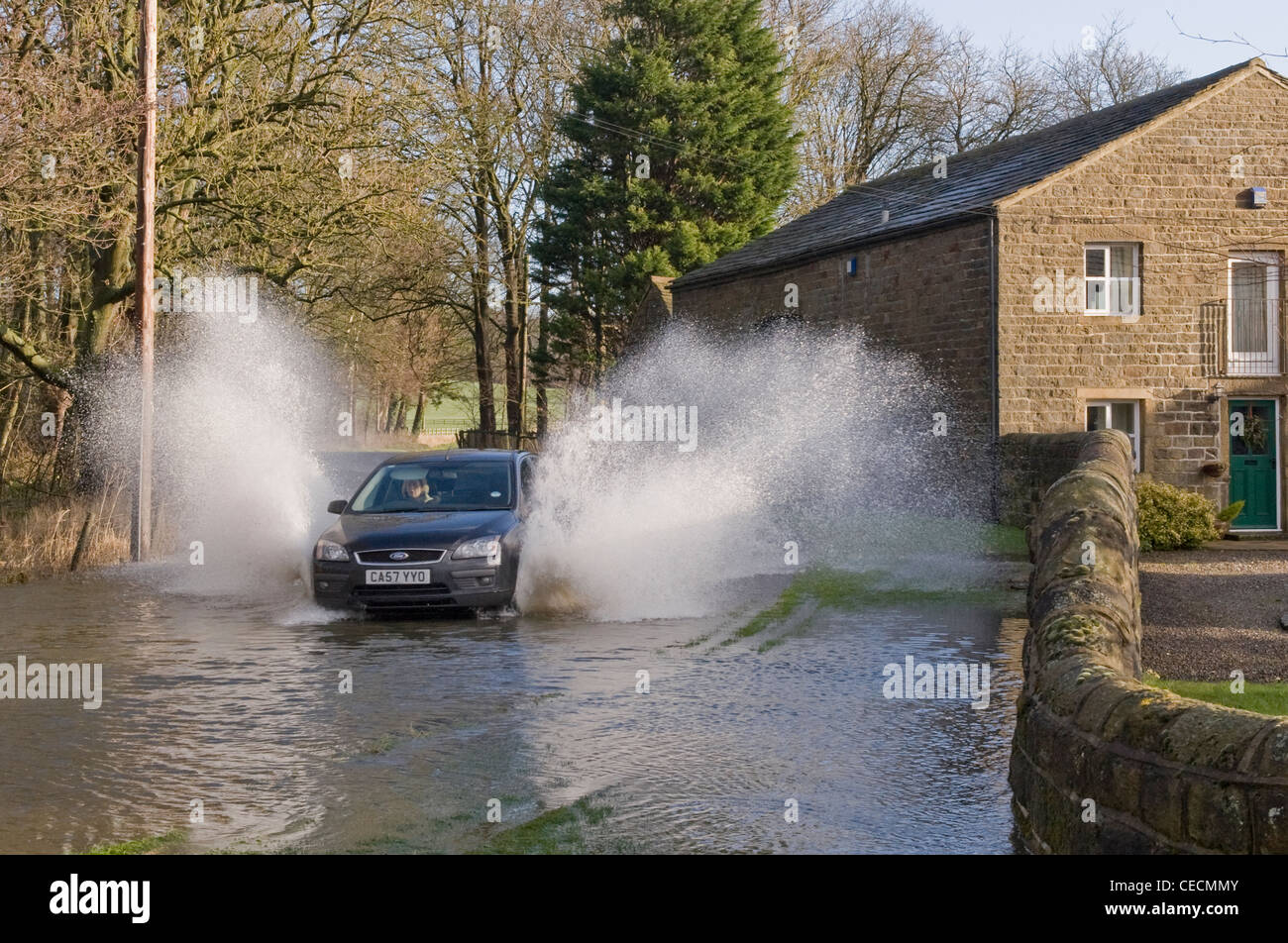 Car driving puddle woman hi-res stock photography and images - Alamy