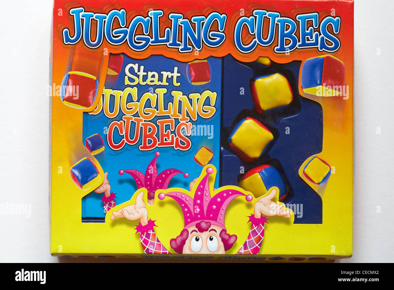 Box of juggling cubes on white background Stock Photo - Alamy