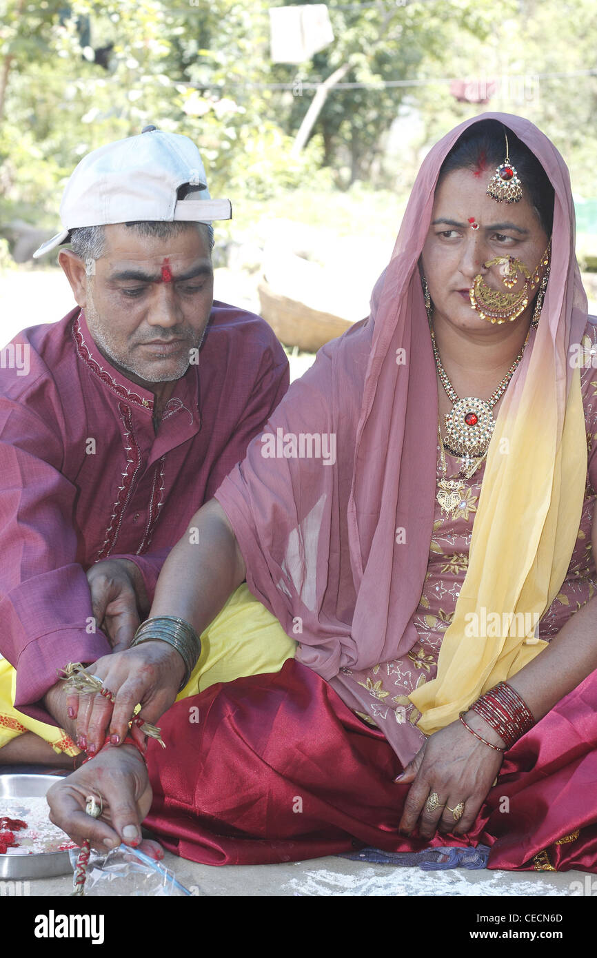Performing pooja hi-res stock photography and images - Alamy