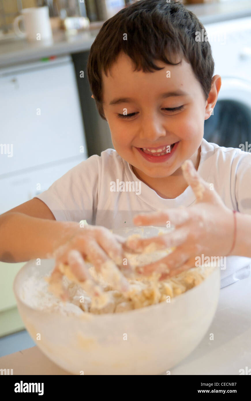 boy making cookies Stock Photo - Alamy