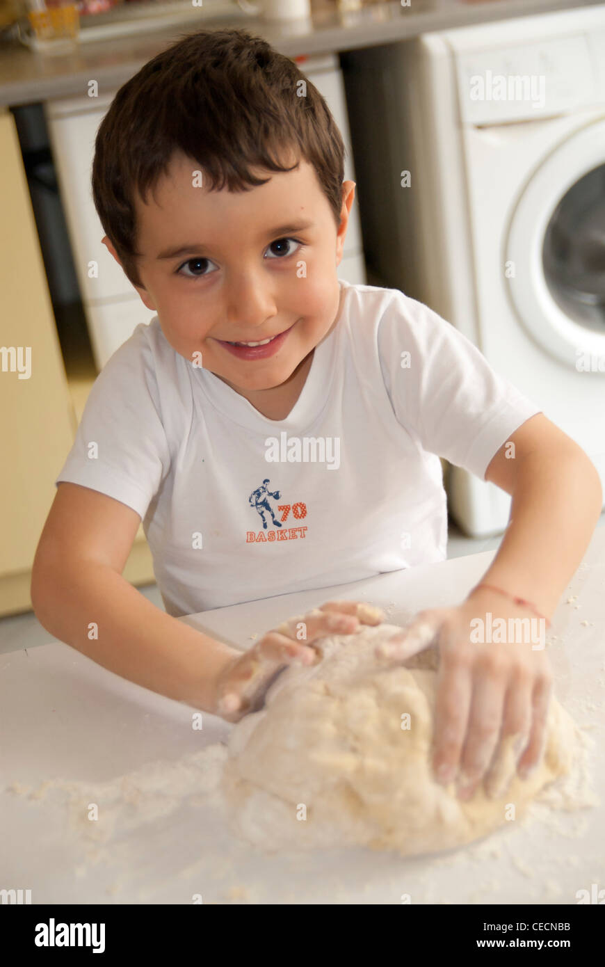 boy making cookies Stock Photo - Alamy