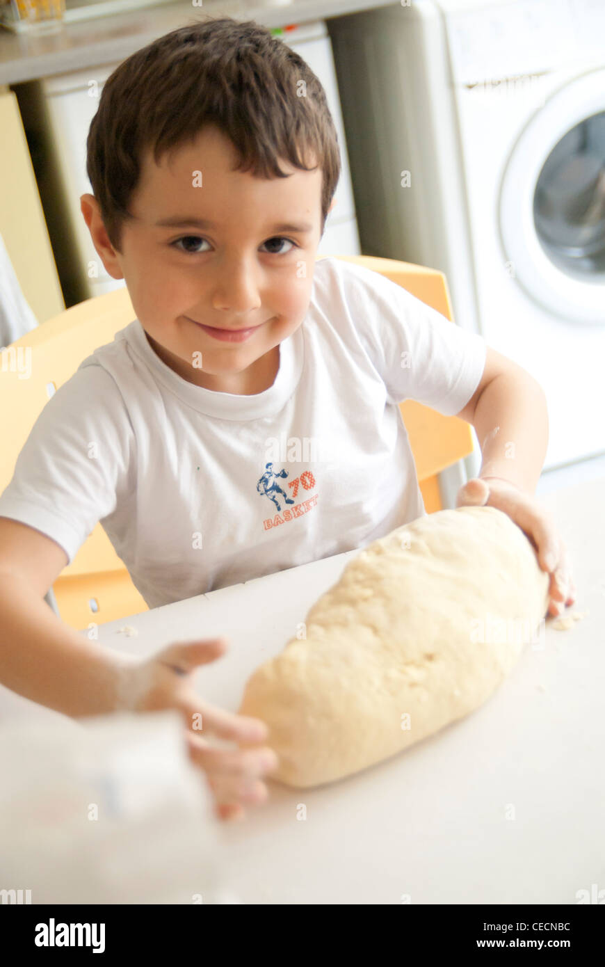 boy making cookies Stock Photo - Alamy