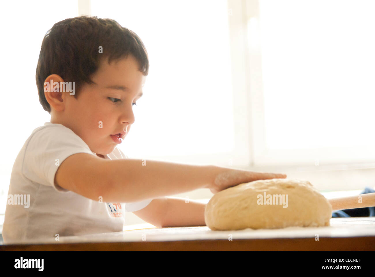 boy making cookies Stock Photo - Alamy