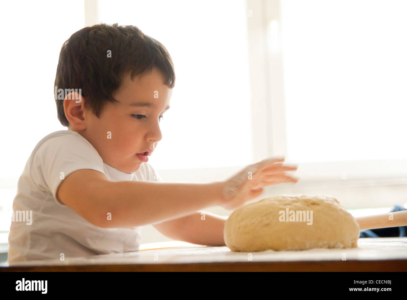 boy making cookies Stock Photo - Alamy