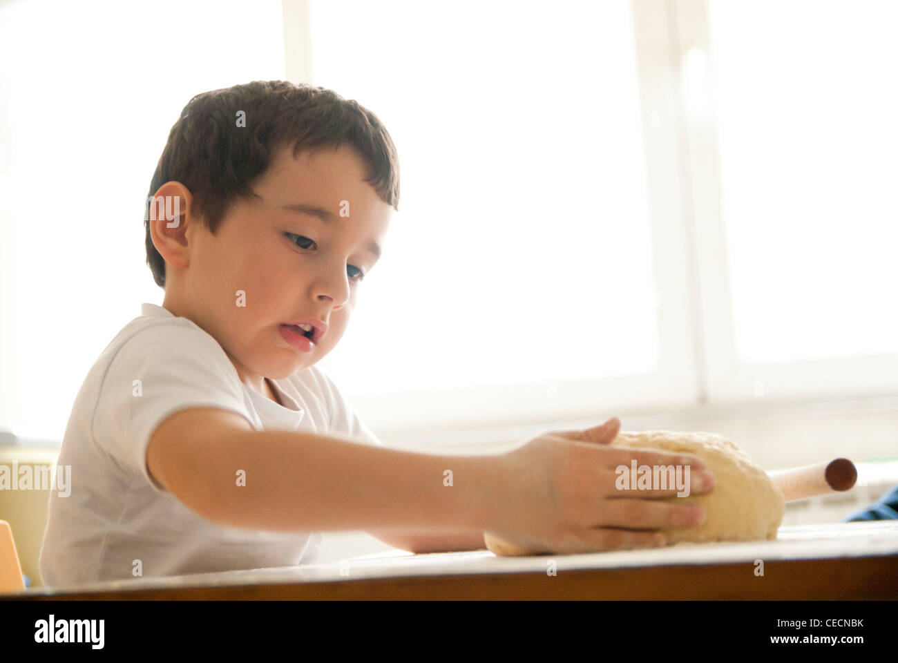 boy making cookies Stock Photo - Alamy