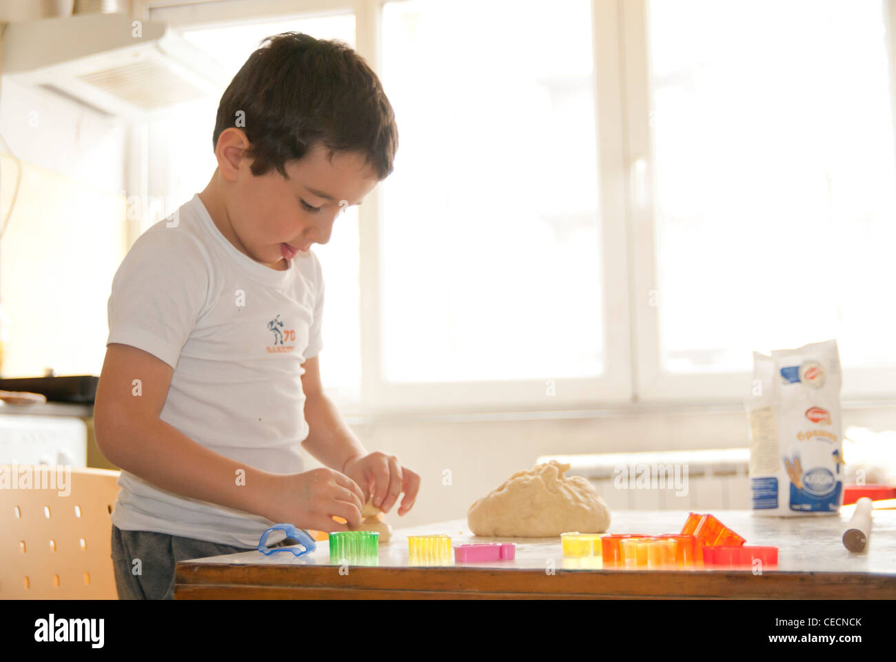 boy making cookies Stock Photo - Alamy