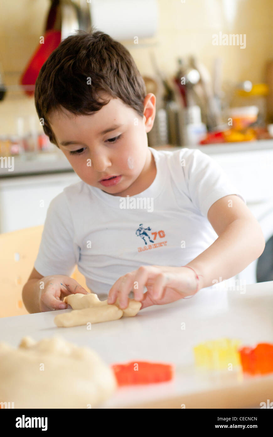 boy making cookies Stock Photo - Alamy