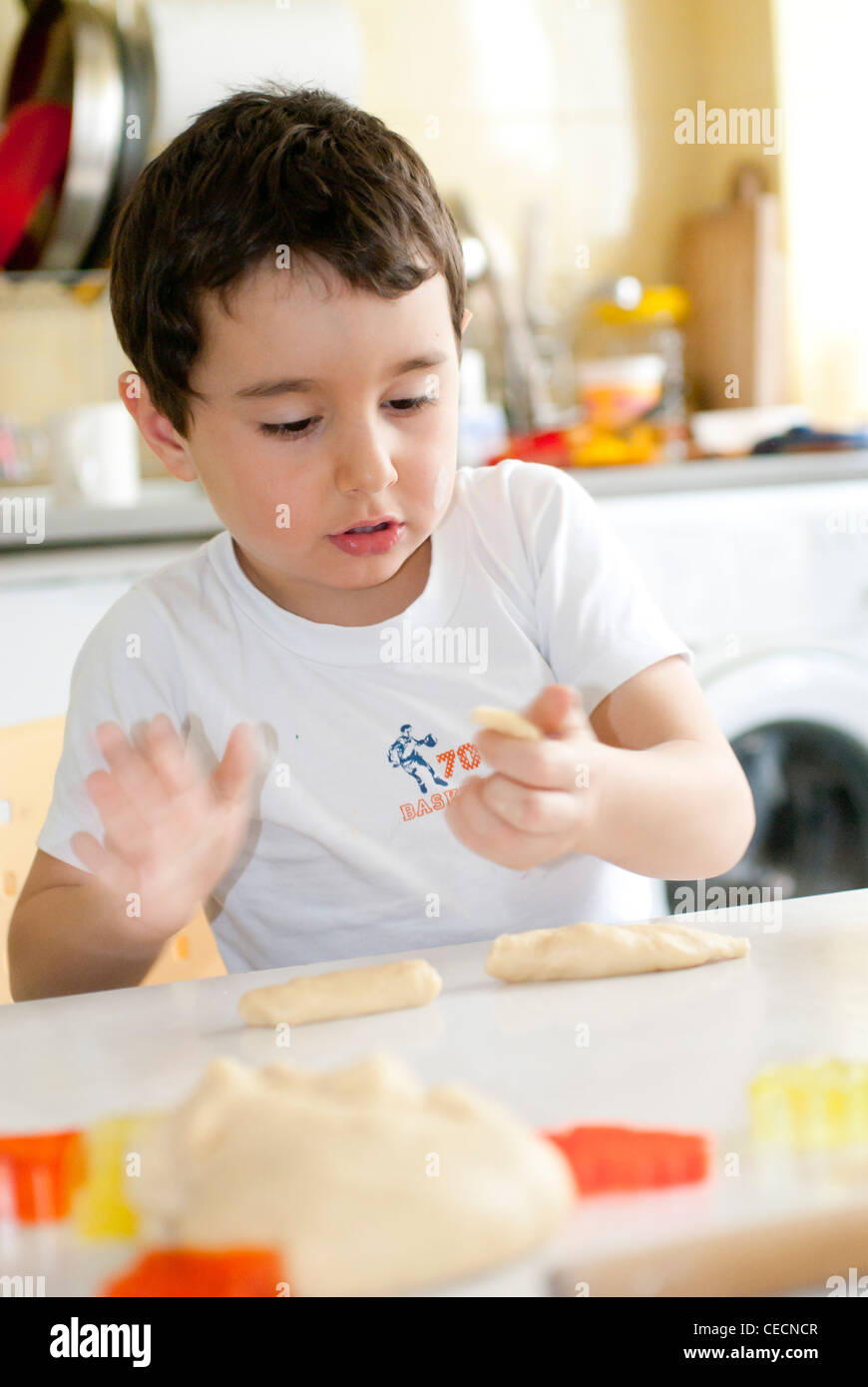 boy making cookies Stock Photo - Alamy