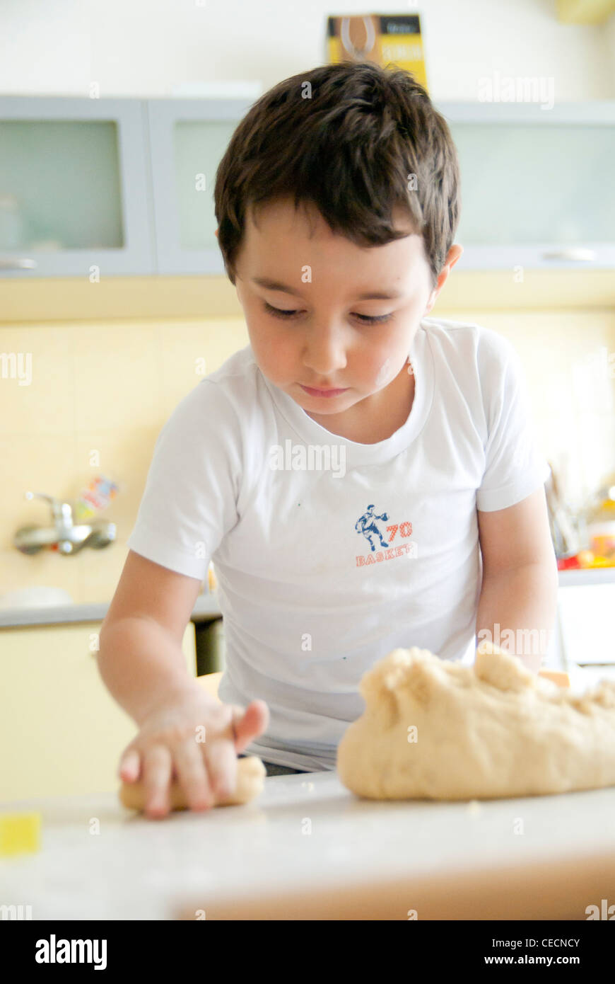boy making cookies Stock Photo - Alamy