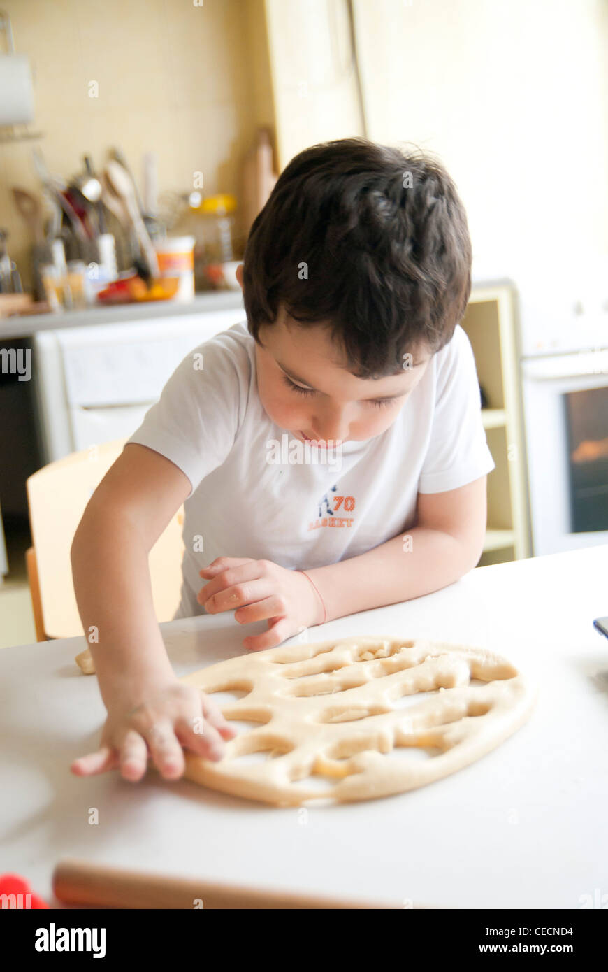 boy making cookies Stock Photo - Alamy