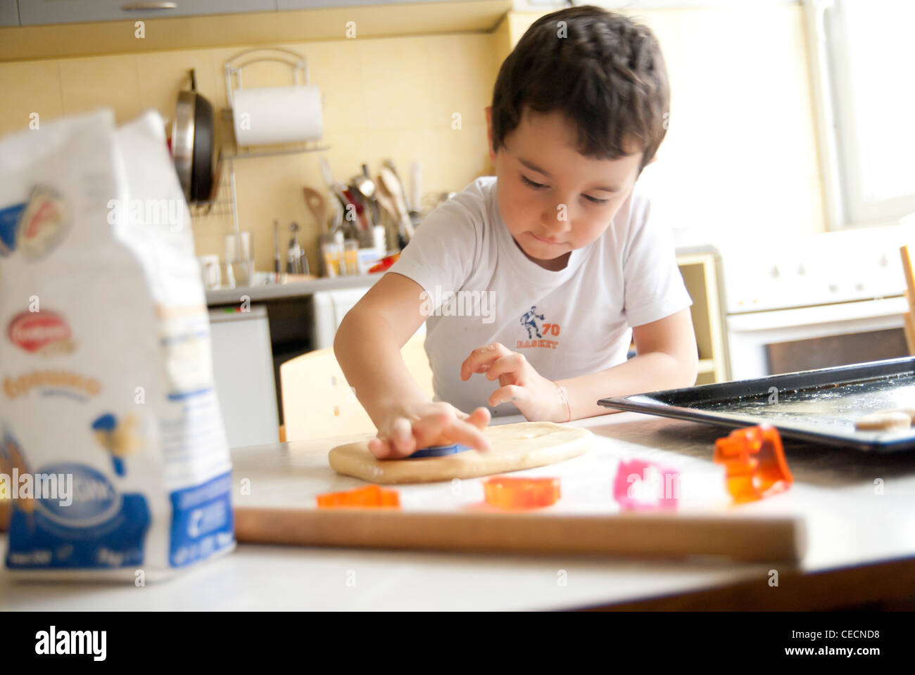 boy making cookies Stock Photo - Alamy