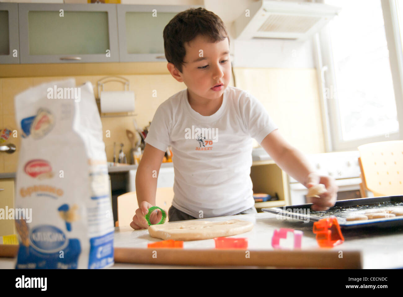 boy making cookies Stock Photo - Alamy