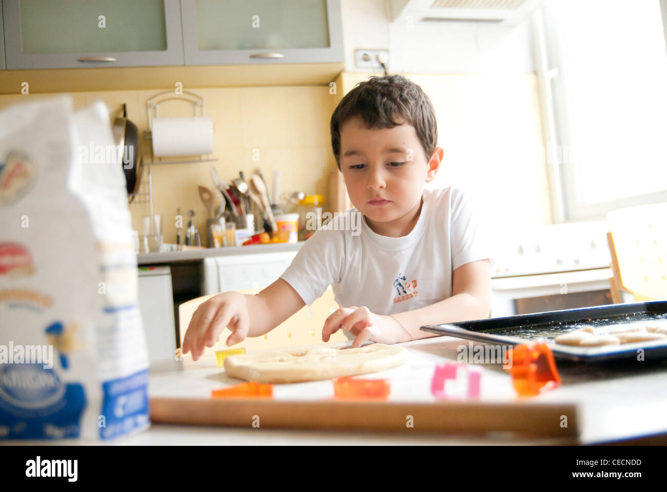 boy making cookies Stock Photo - Alamy
