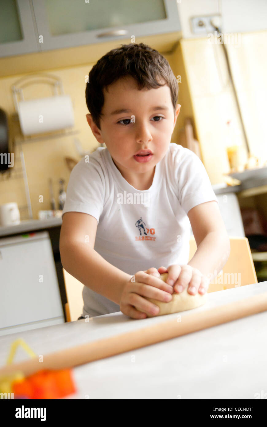 boy making cookies Stock Photo - Alamy
