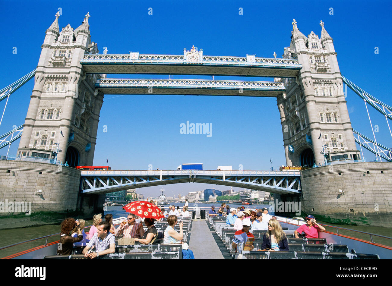 England, London, Tourists on Tour Boat Passing Under Tower Bridge Stock ...