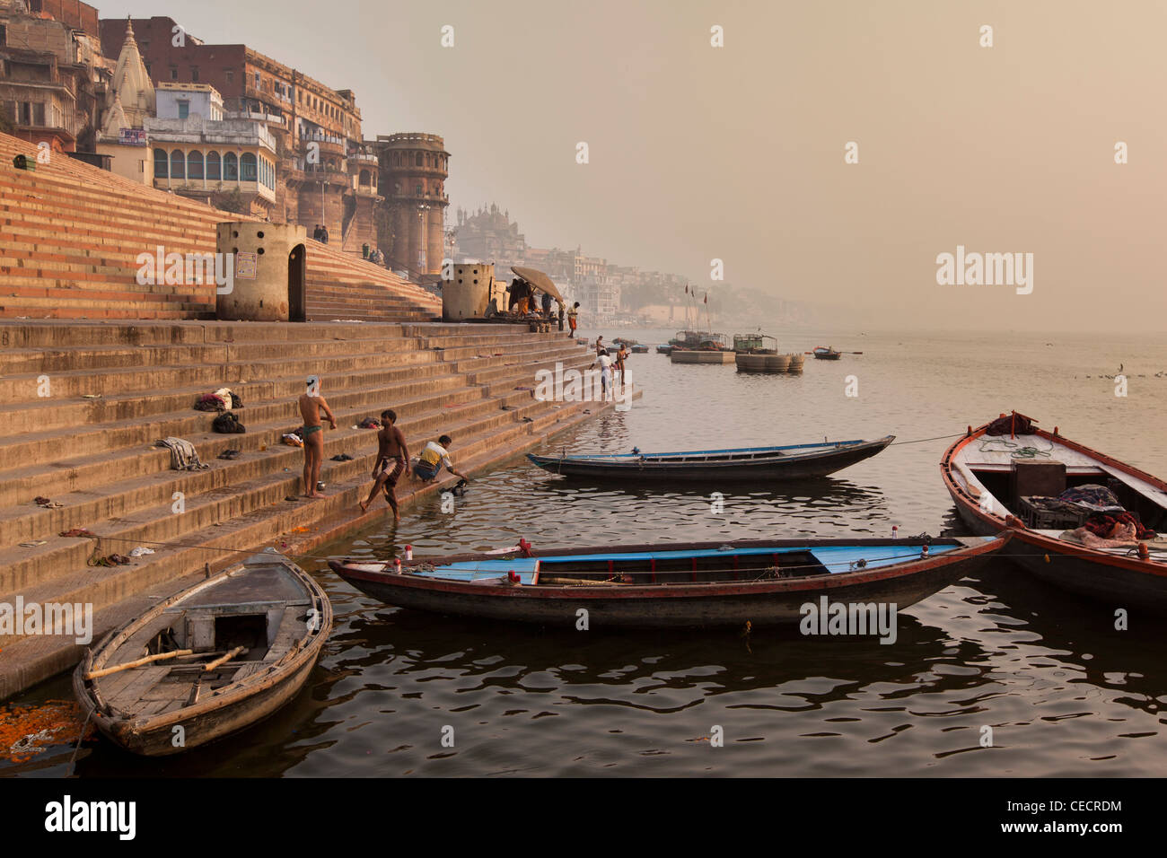India, Uttar Pradesh, Varanasi, Scindia Ghat, view along River Ganges ...